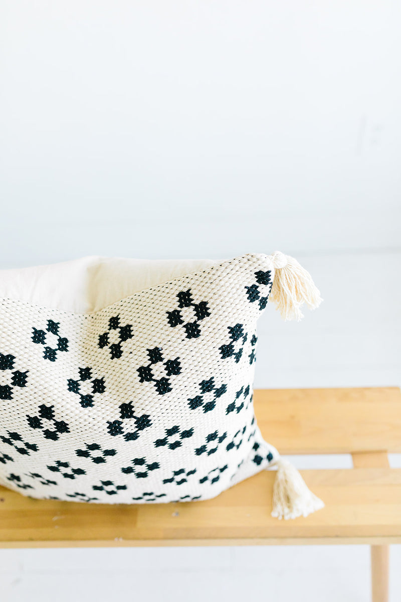 Hansi | Handmade throw pillows and blankets | The Global Stitch