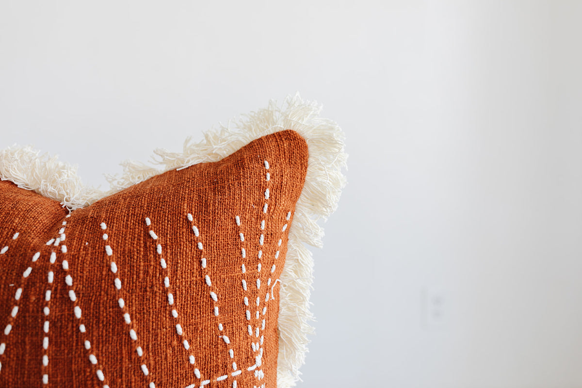 Tikung | Handmade throw pillows and blankets | The Global Stitch