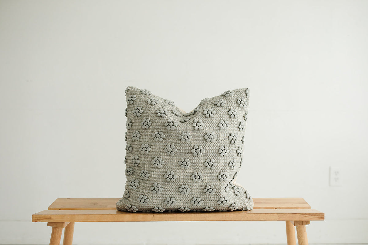 Saipura | Handmade throw pillows and blankets | The Global Stitch