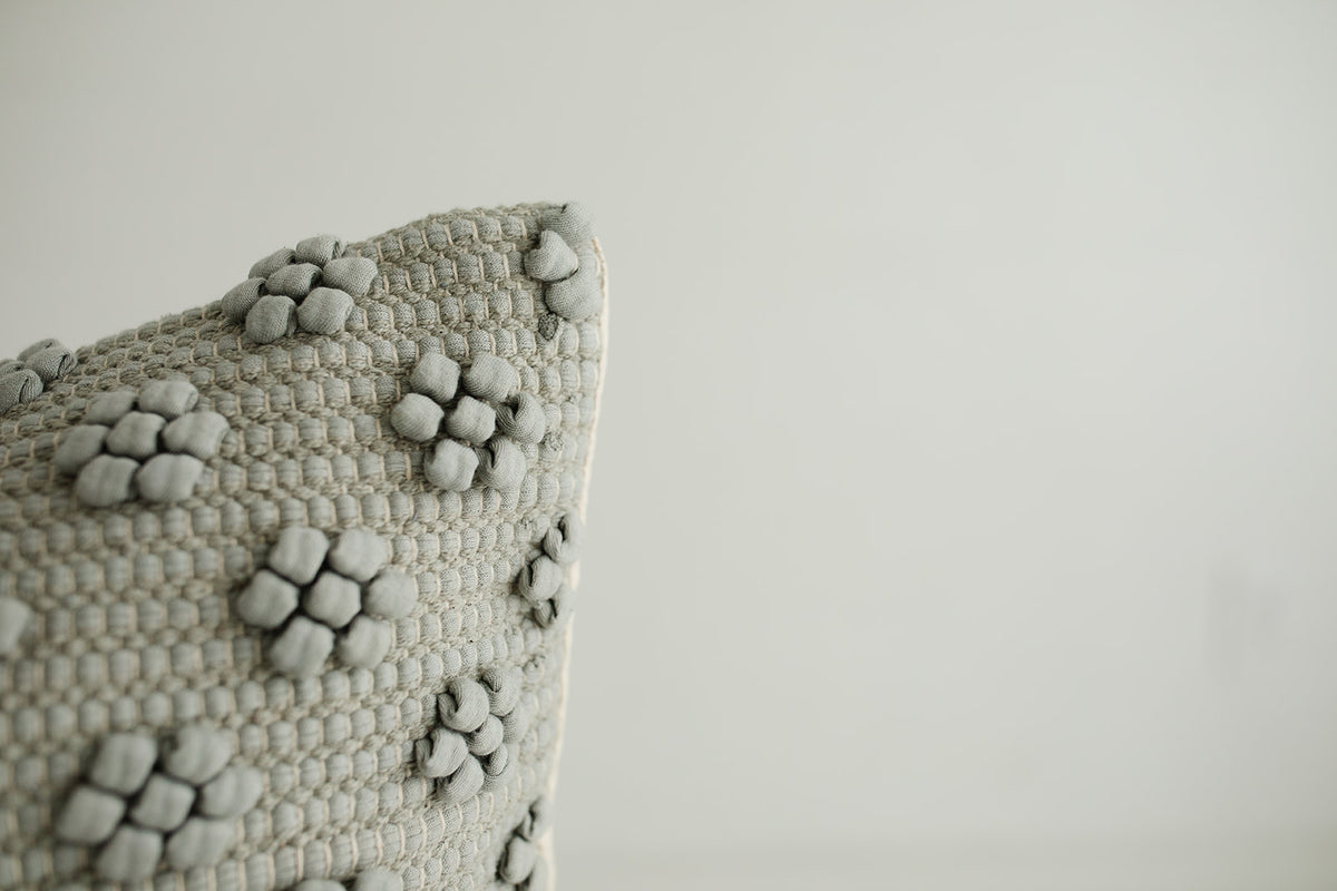 Saipura | Handmade throw pillows and blankets | The Global Stitch