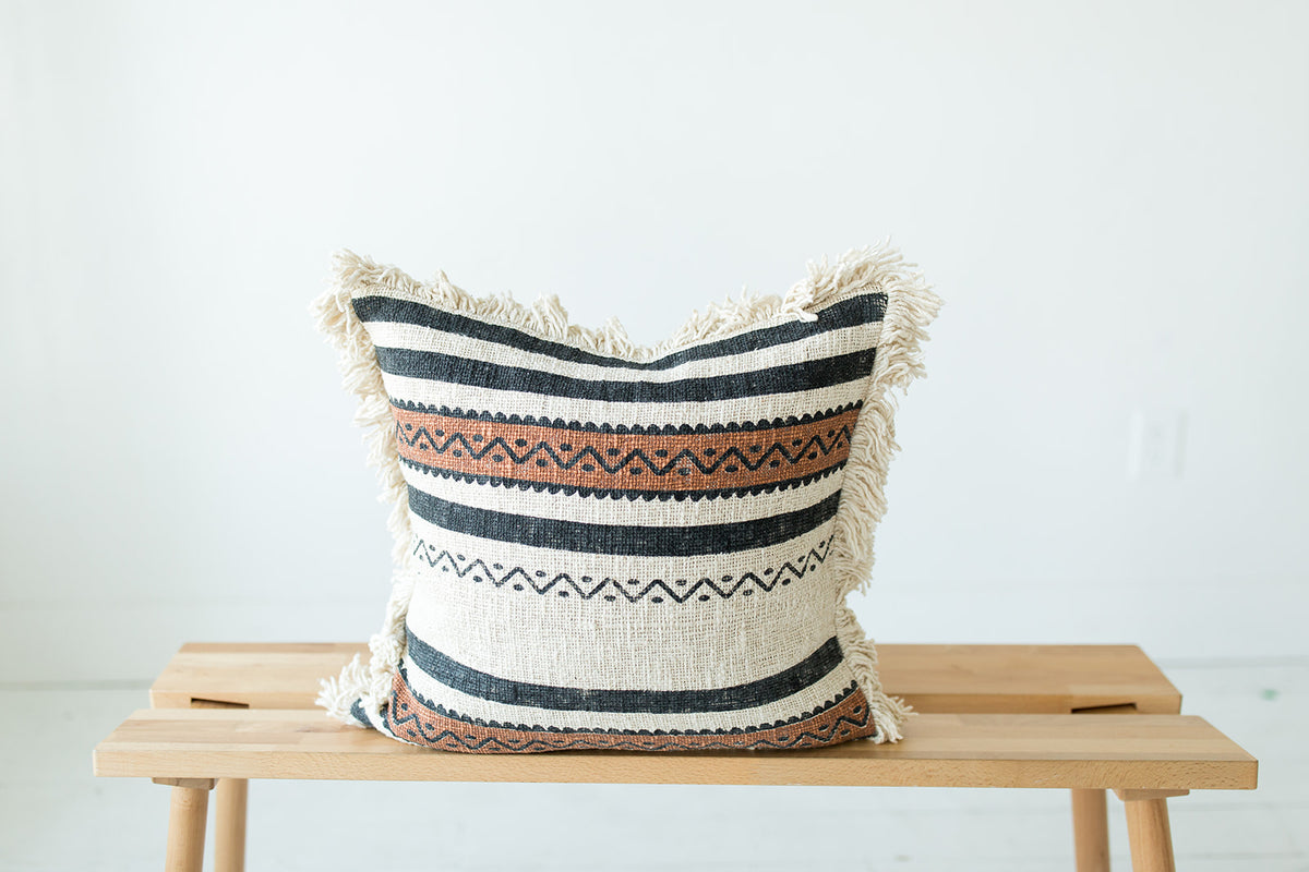 Kubu | Handmade throw pillows and blankets | The Global Stitch