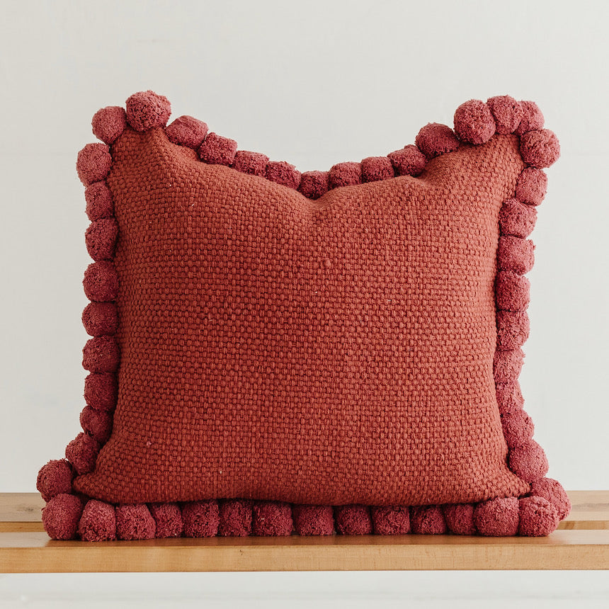 Nohra | Handmade throw pillows and blankets | The Global Stitch
